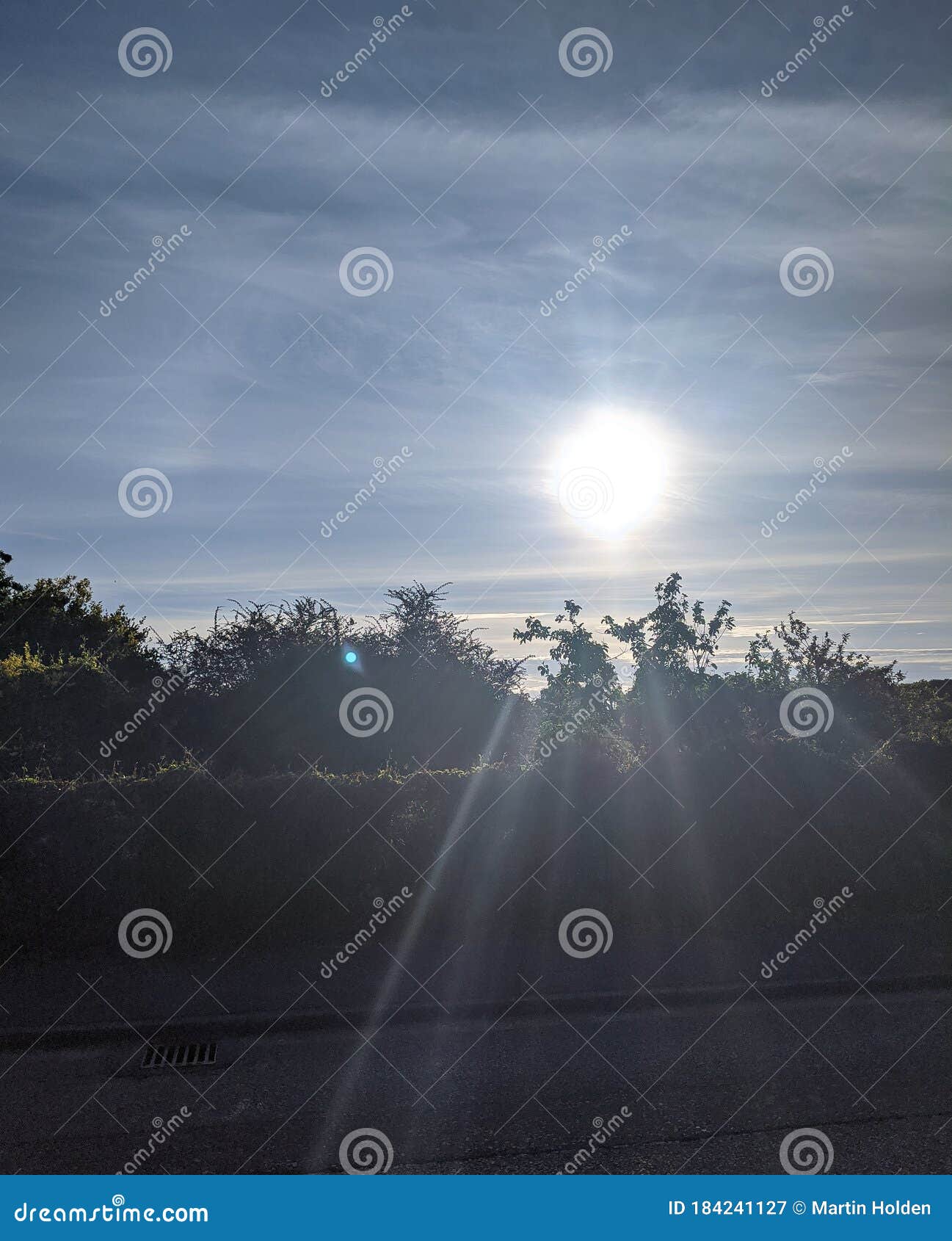 Weak sunset stock image. Image of dusk, flare, sunlight - 184241127