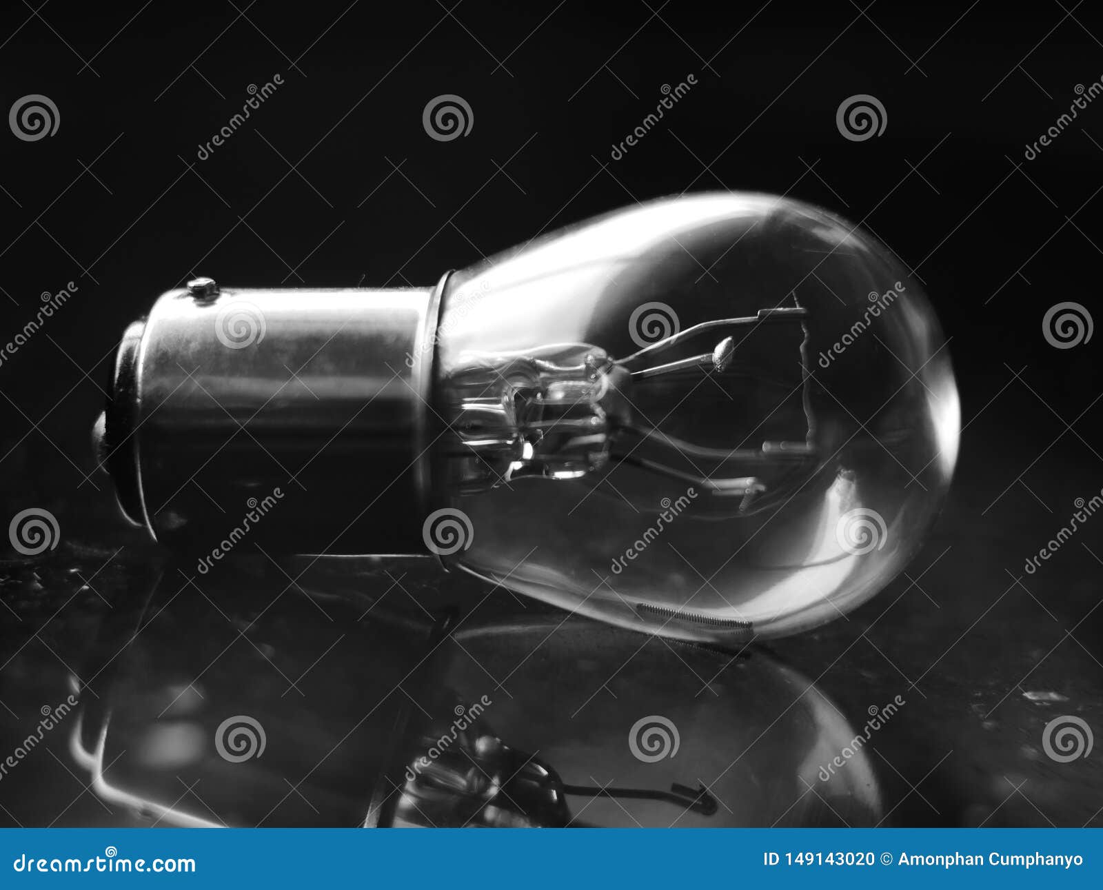 Weak Yellow Bulb Light on Black Background Stock Photo - Image of ...