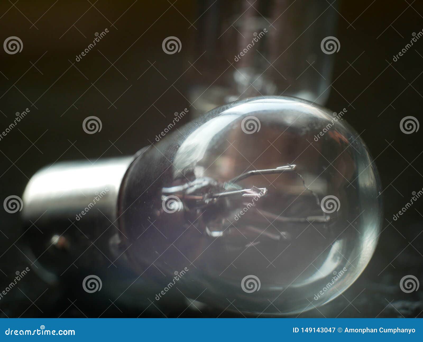Weak Yellow Bulb Light on Black Background Stock Image - Image of black ...