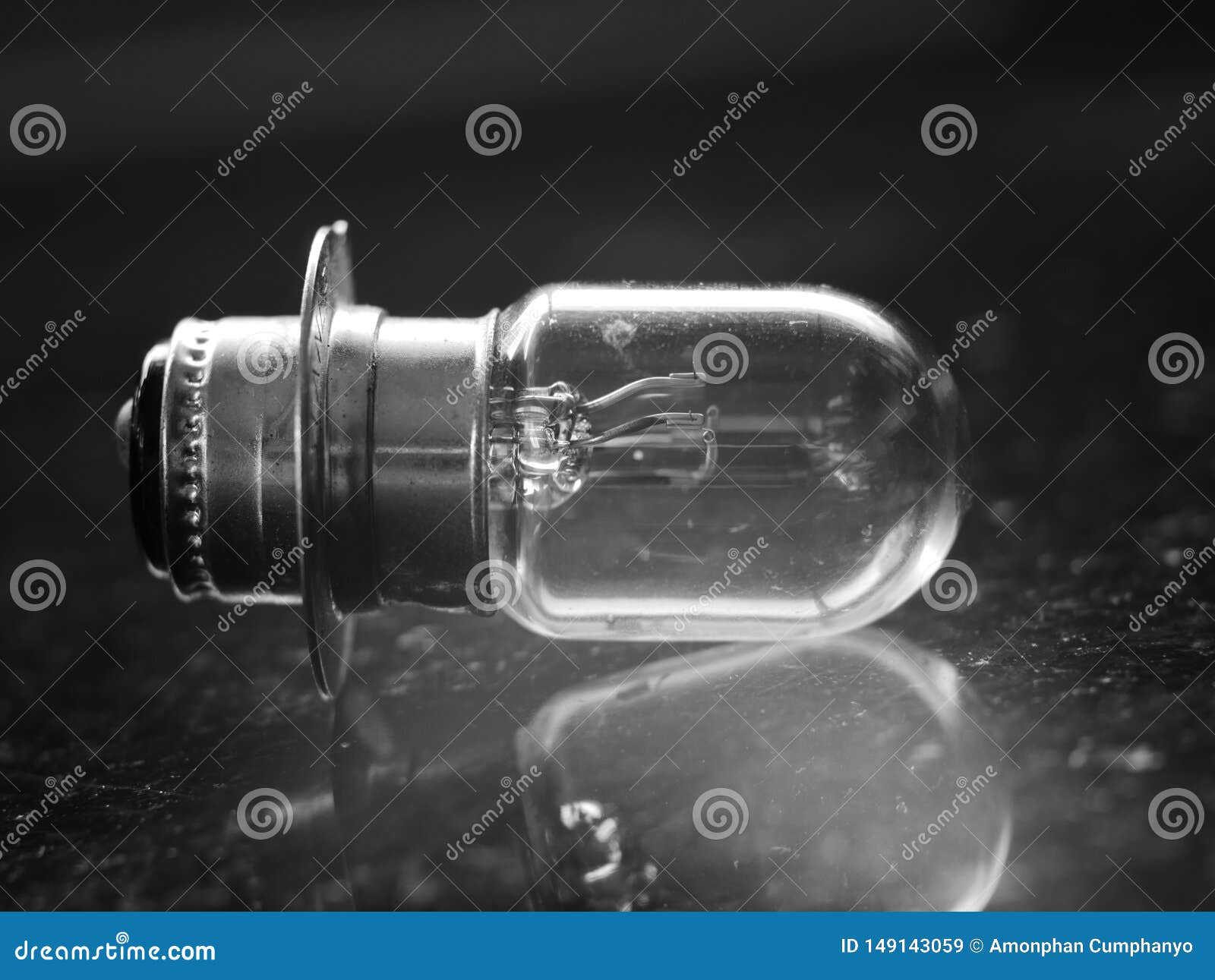 Weak Yellow Bulb Light on Black Background Stock Image - Image of ...