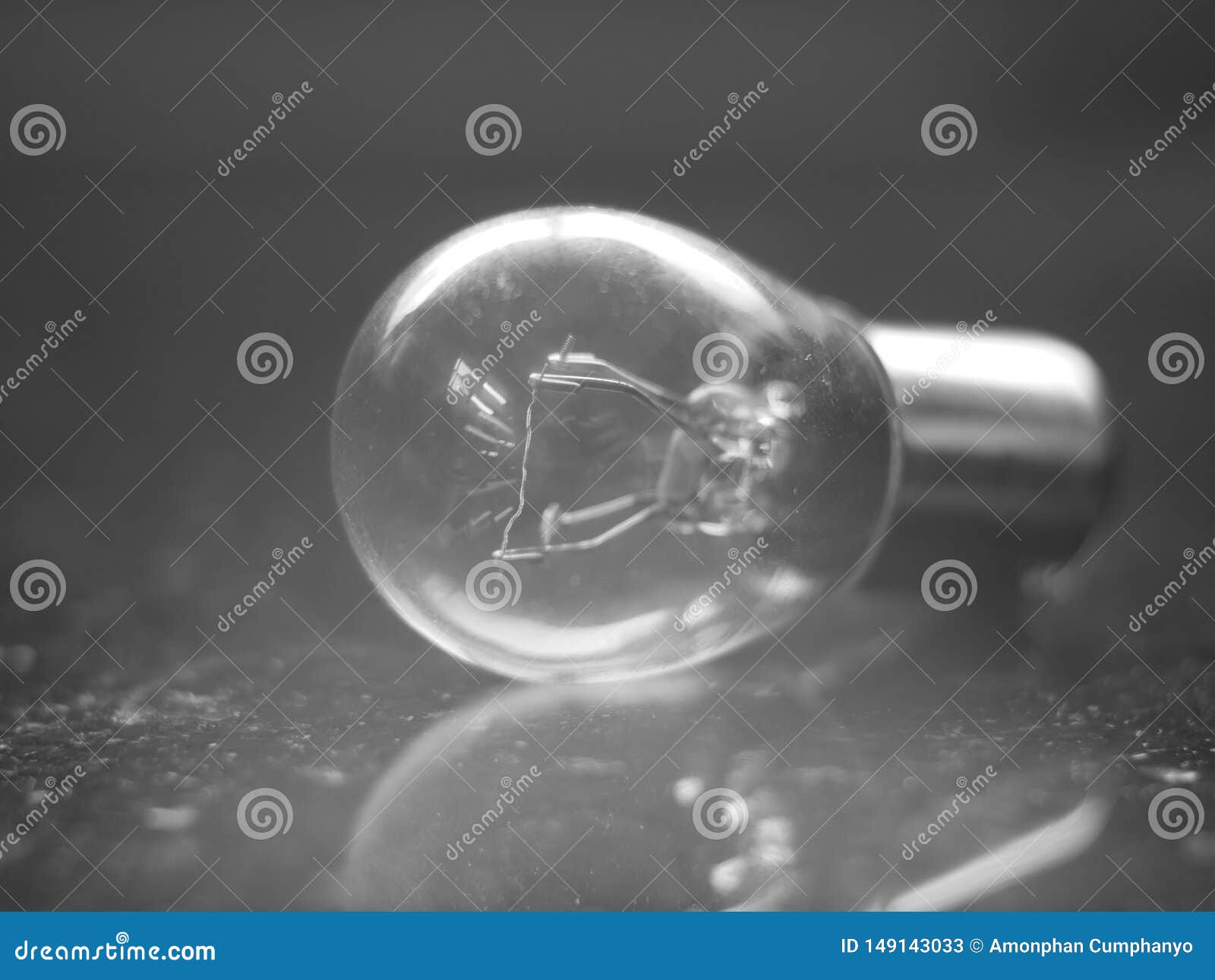 Weak Yellow Bulb Light on Black Background Stock Image - Image of ...