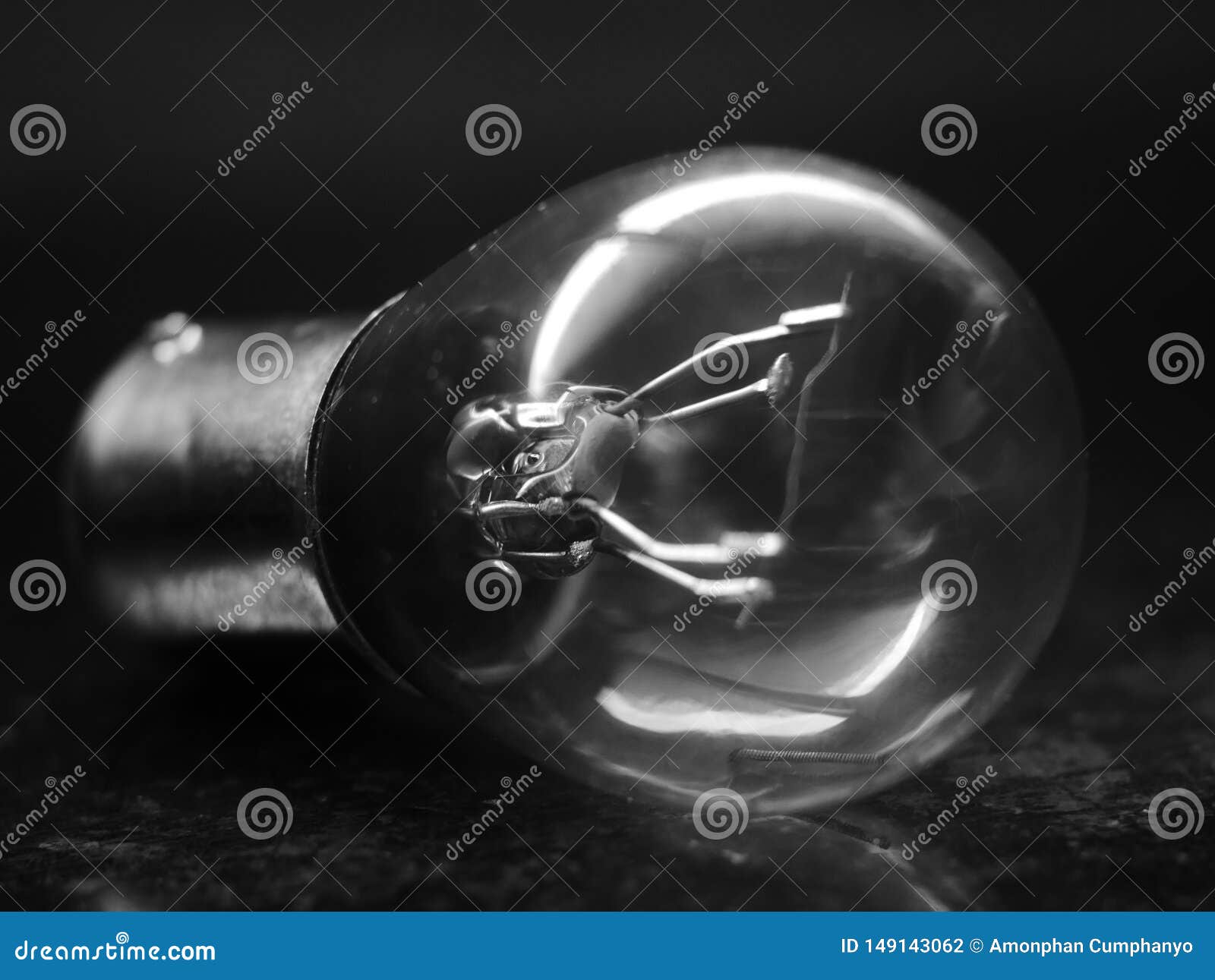Weak Yellow Bulb Light on Black Background Stock Photo - Image of ...