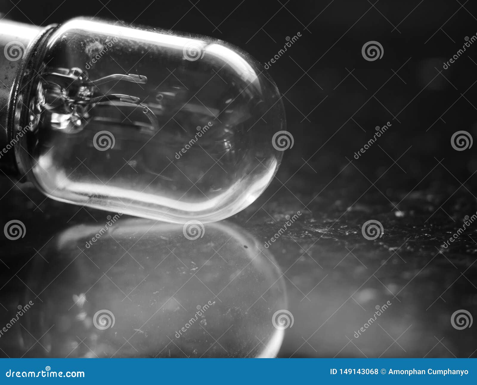 Weak Yellow Bulb Light on Black Background Stock Photo - Image of ...