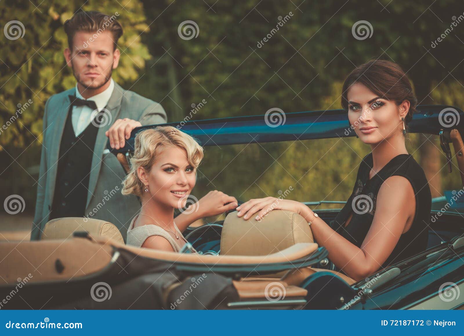 Wealthy Young Friends in a Classic Convertible Stock Photo - Image of ...