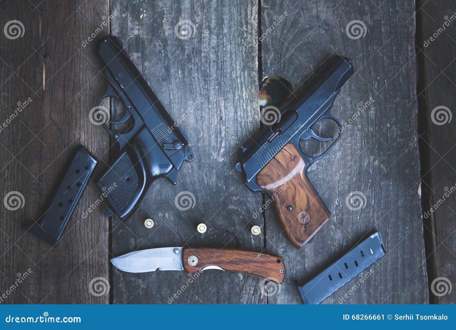 Weapons on the Background of a Wooden Table Stock Image - Image of ...