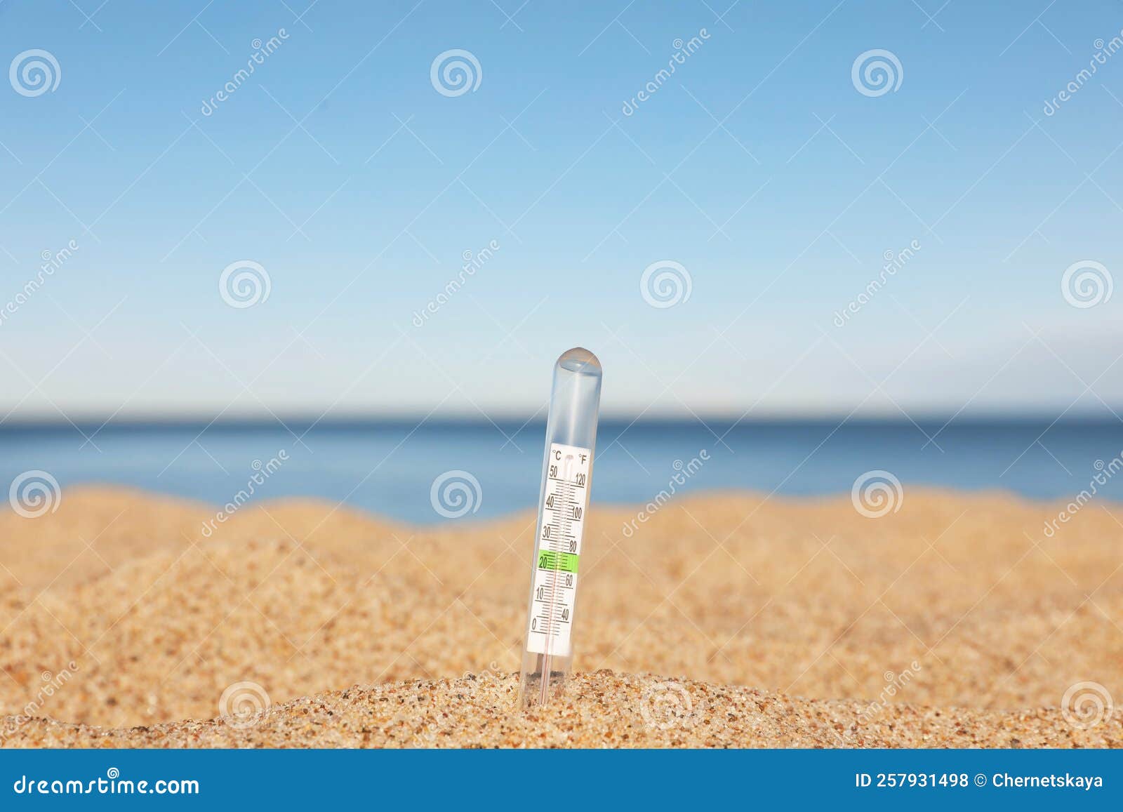 Weather Thermometer in Sand Near Sea, Space for Text Stock Photo ...