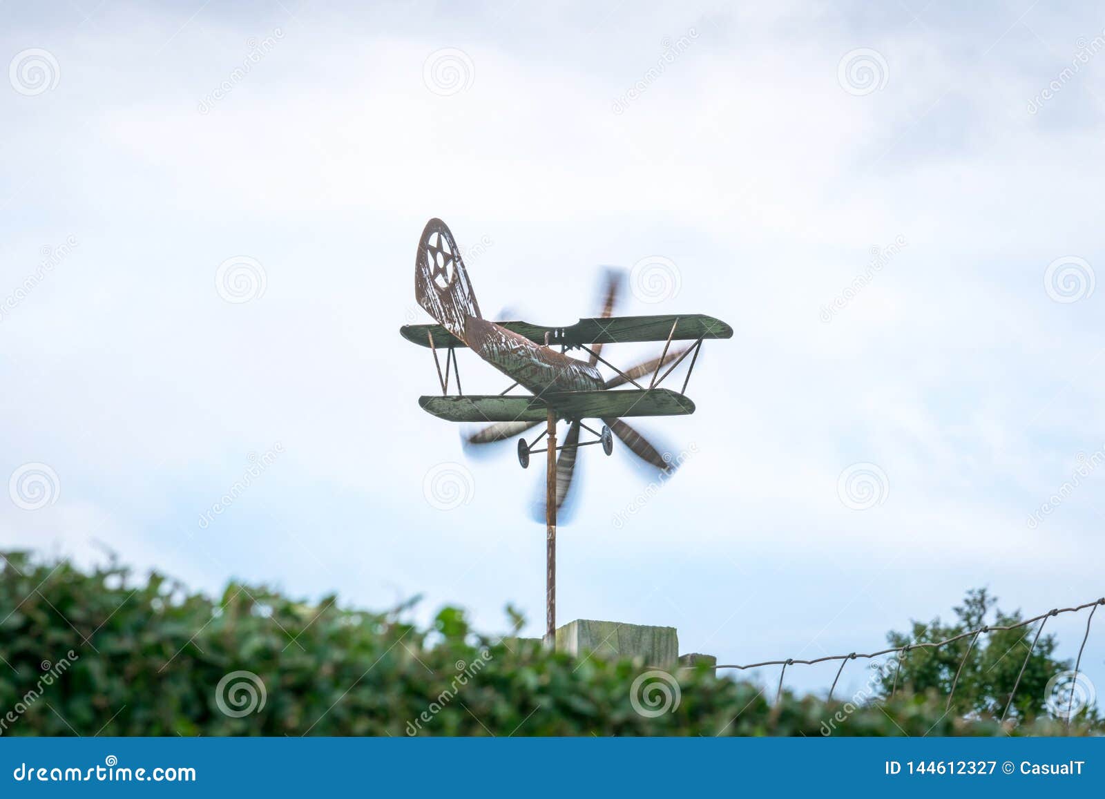 Weather Vane in Form of an Old Rusty Biplane at a Back Angle, with ...