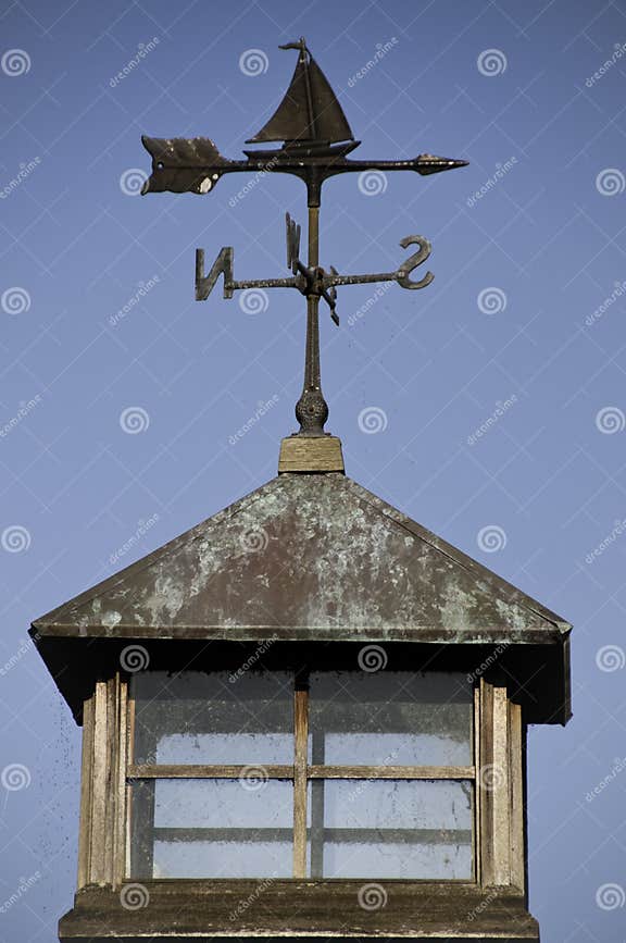 Weather Vane and window stock image. Image of vane, east - 14269733