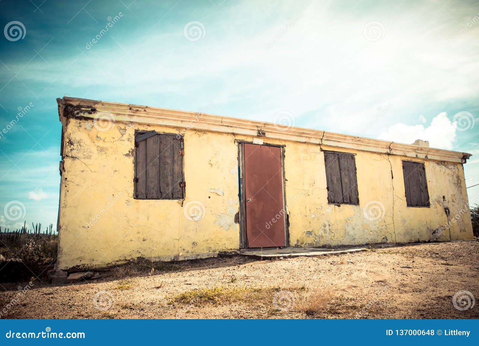 Weathered Abandoned Building with Peeling Yellow Paint Stock Photo ...