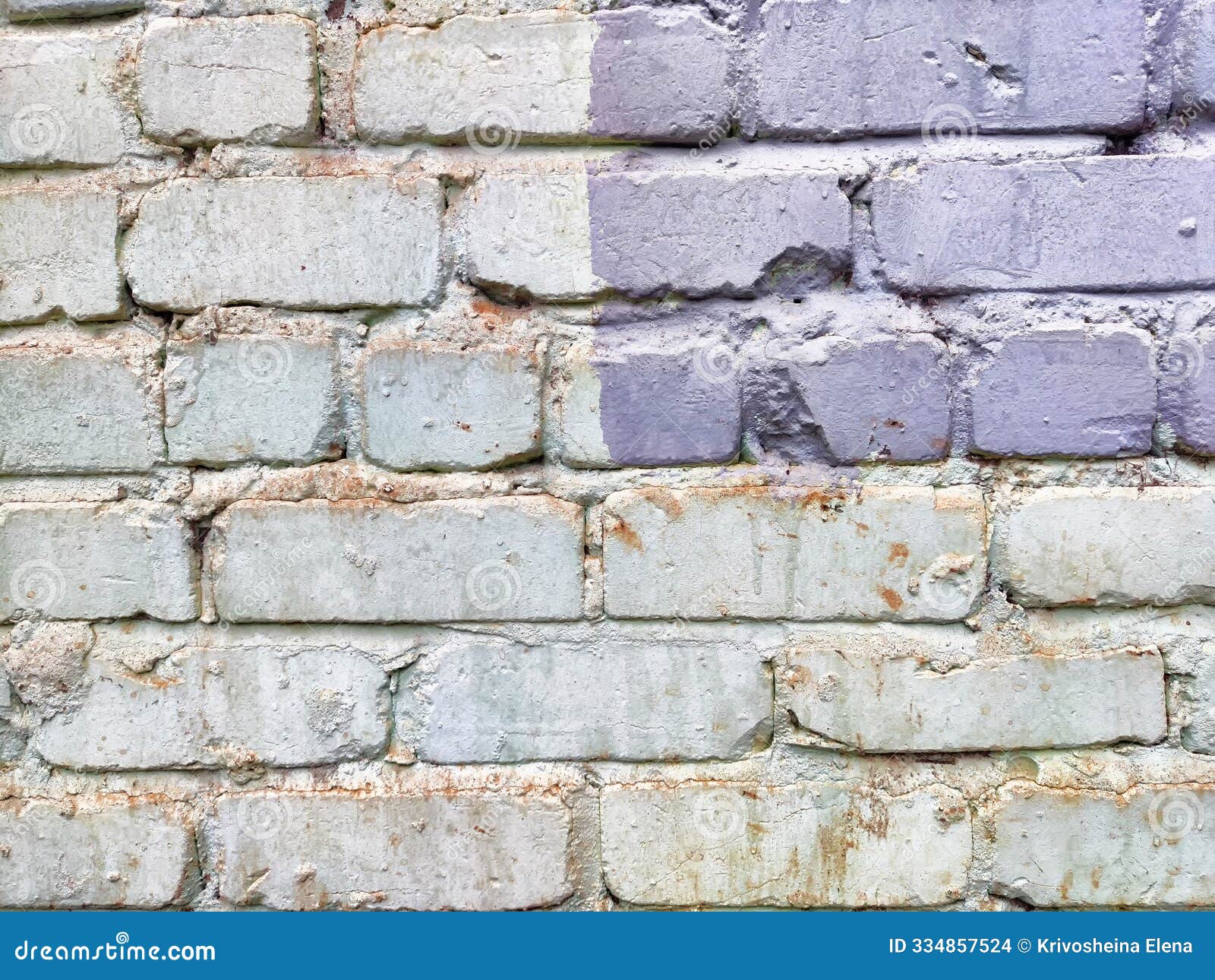 A Weathered Brick Wall Displays a Mix of Muted Colors and Textures ...