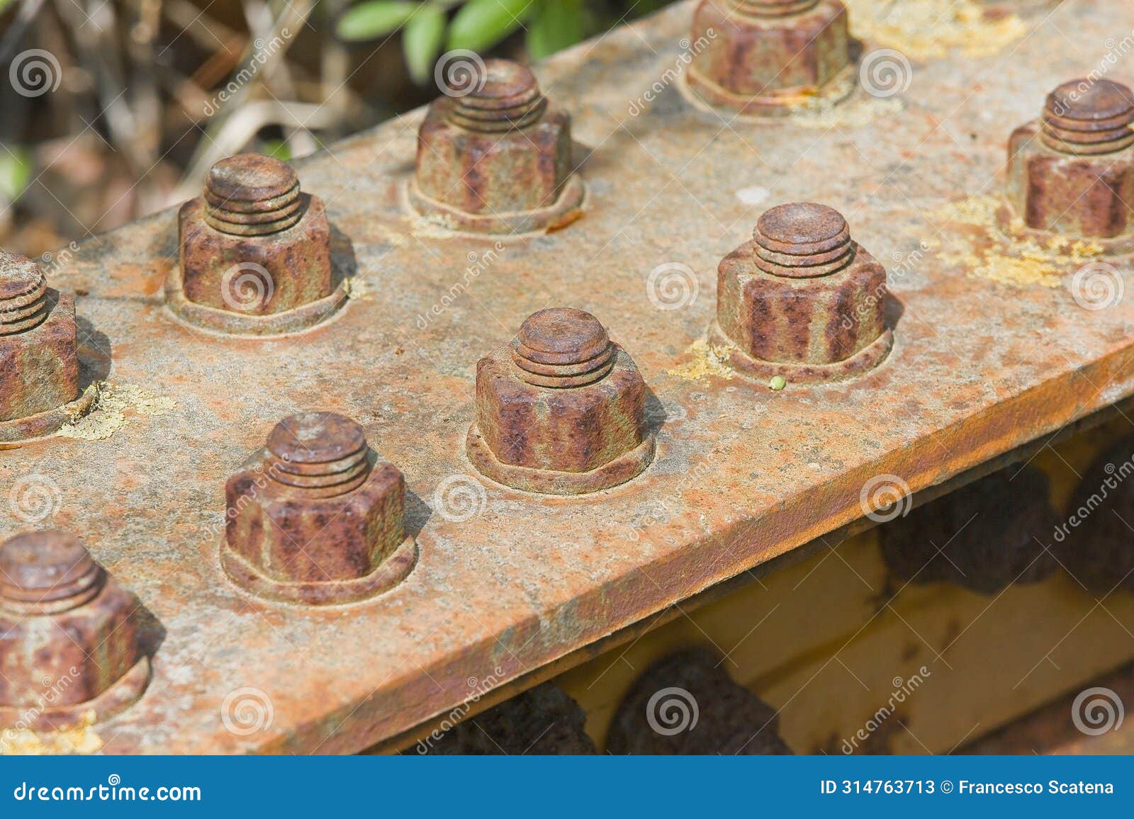 Weathered and Decaying Metal Framework with Rust-encrusted Bolts and ...
