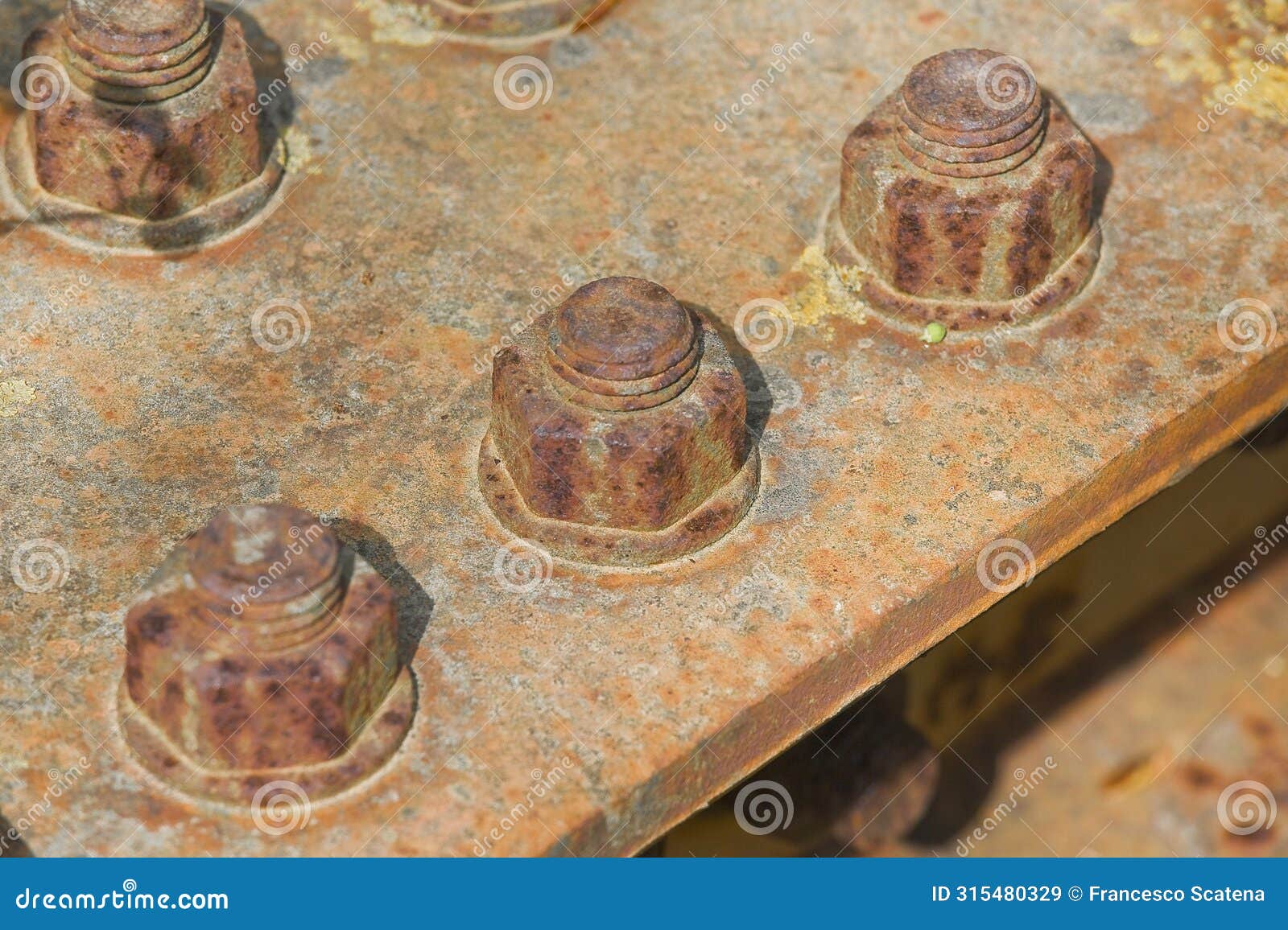 Weathered and Decaying Metal Framework with Rust-encrusted Bolts and ...