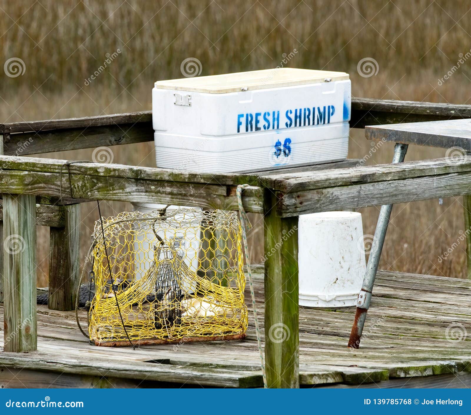 A Crab Pot and Cooler on a Dock in a Salt-marsh. Stock Photo - Image of ...