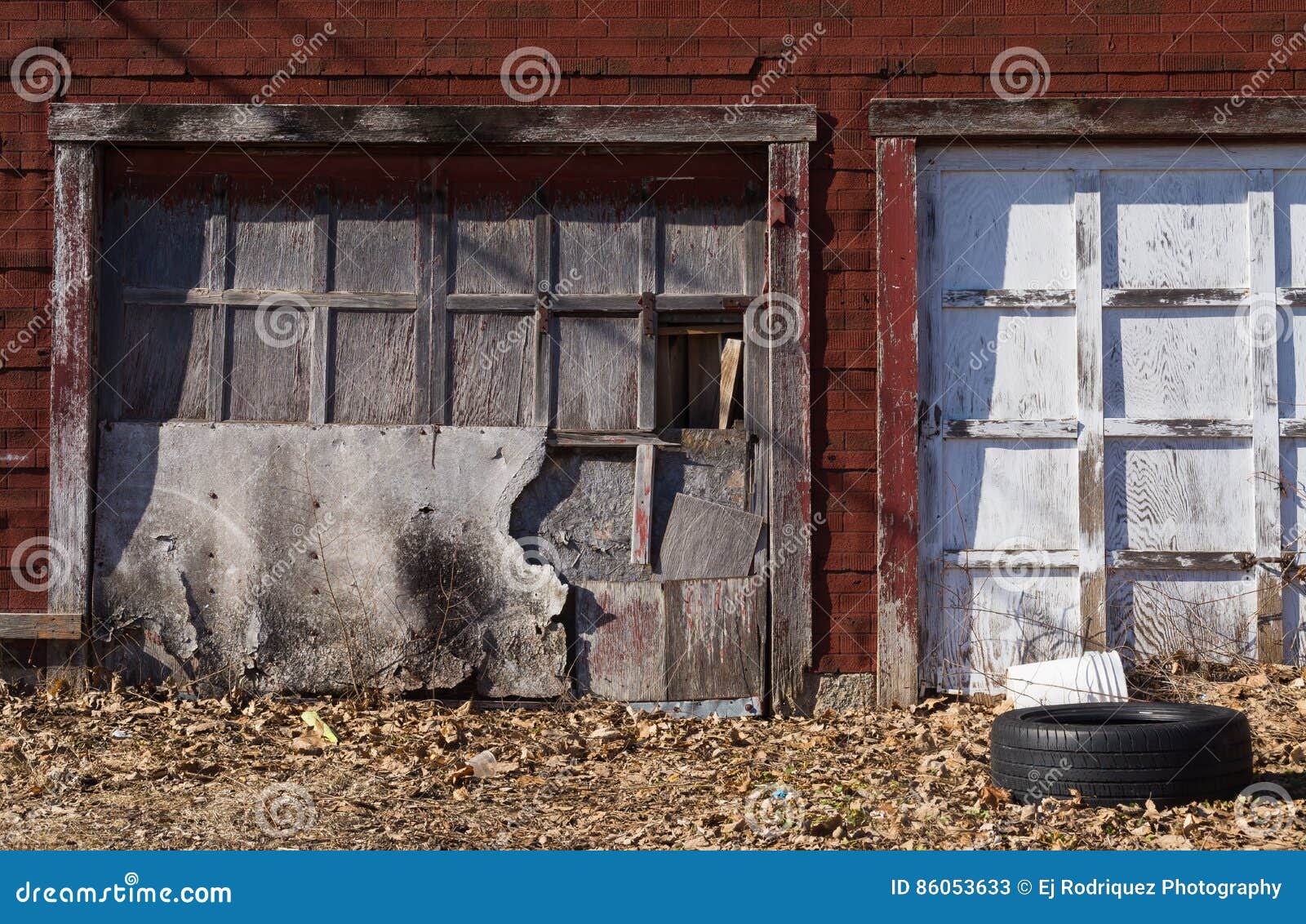 Weathered garage doors. stock image. Image of broken - 86053633