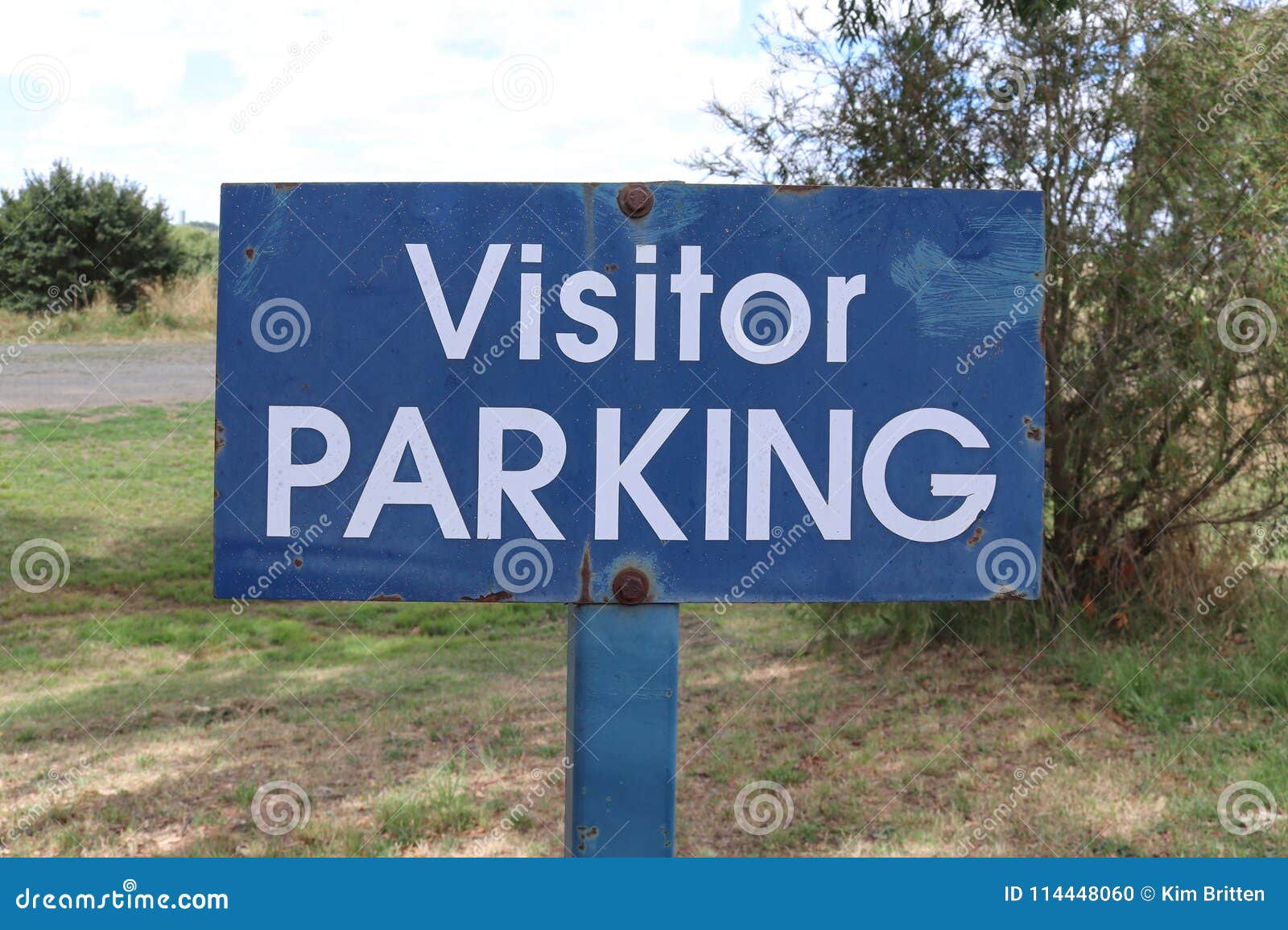 Weathered Metal Blue and White Visitor Parking Sign Stock Photo - Image ...