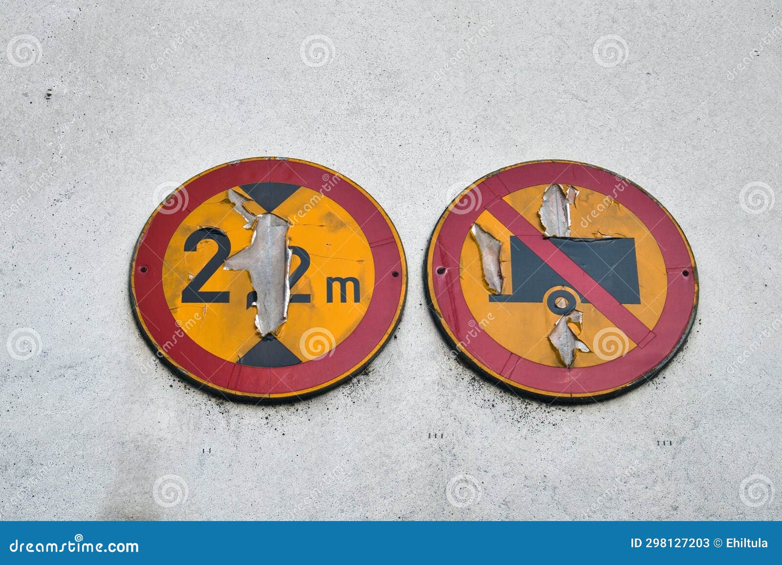 Weathered Restriction Traffic Signs on a Parking Garage Wall Stock ...