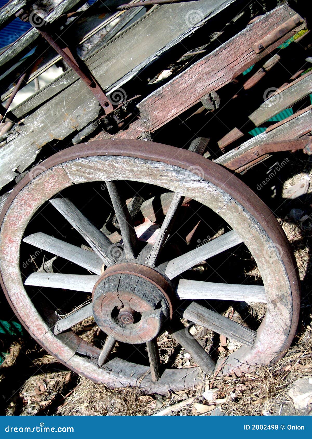 Weathered wagon wheel stock photo. Image of sunny, detached - 2002498