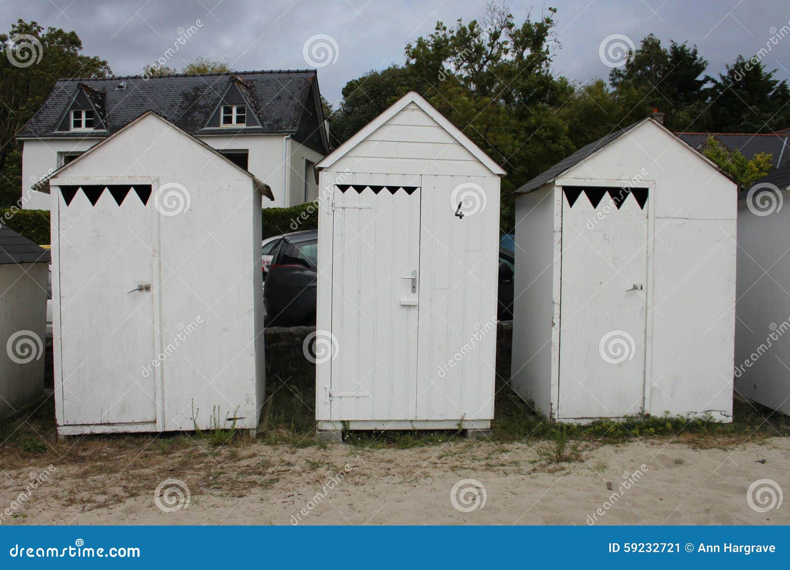 Weathered white beach huts stock image. Image of outdoors - 59232721