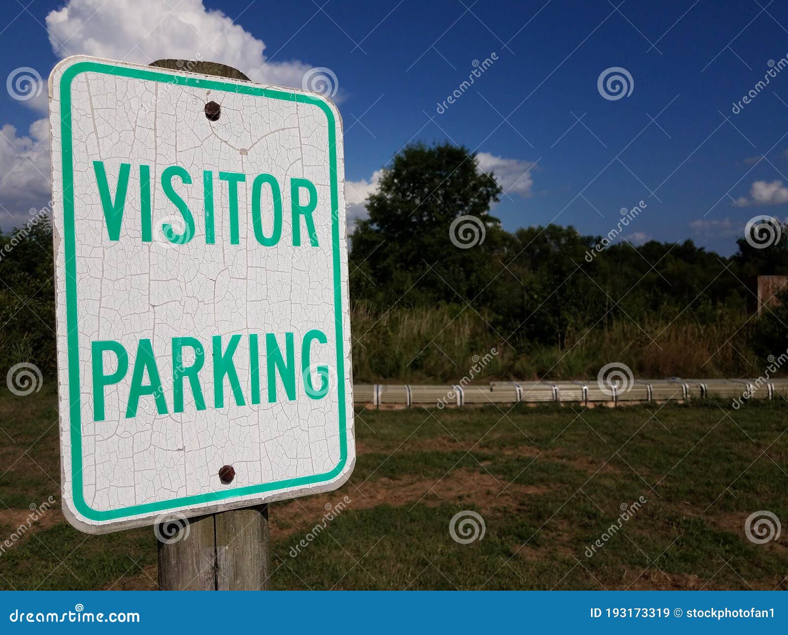 Weathered White and Green Visitor Parking Sign Stock Image - Image of ...
