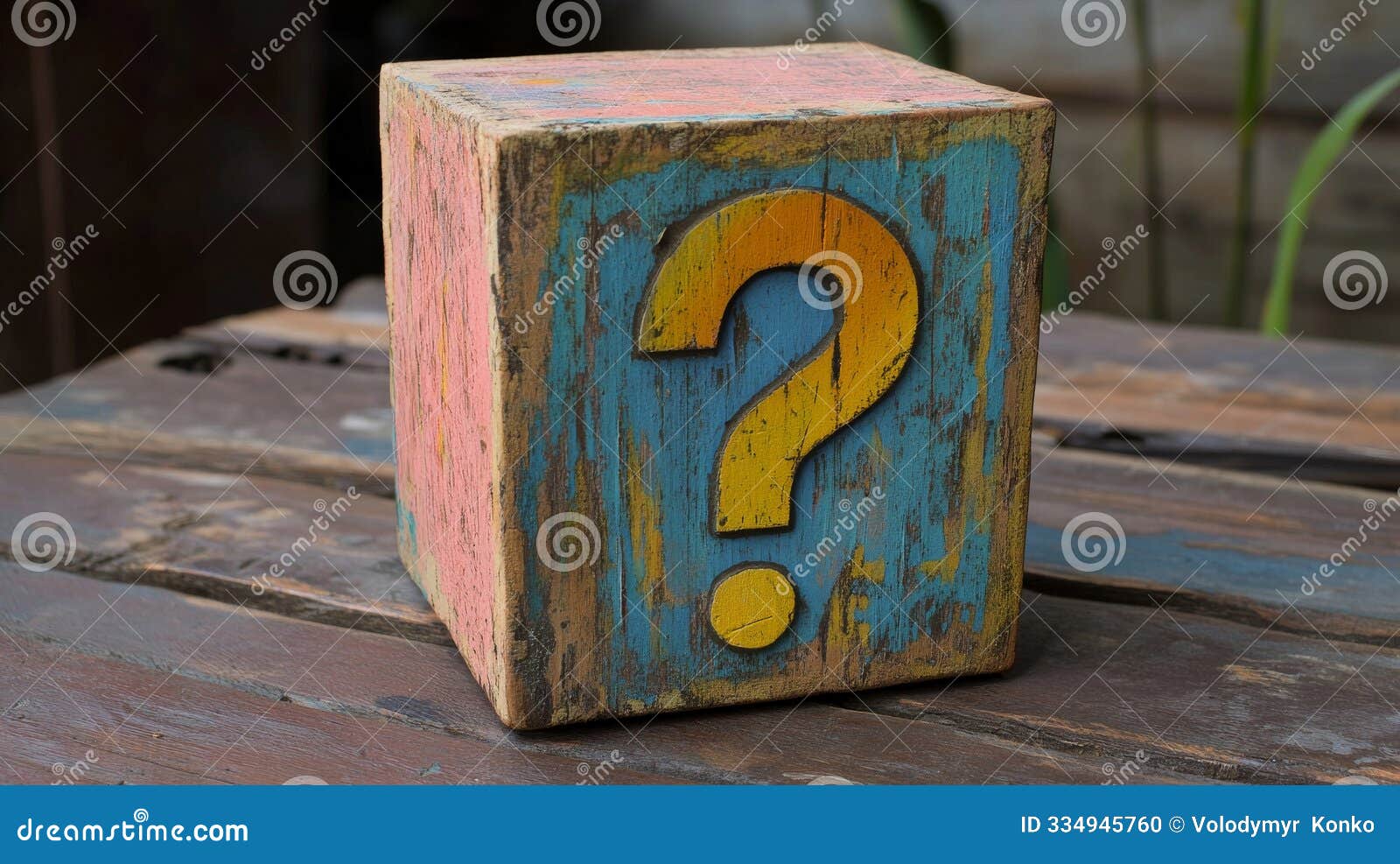 Weathered Wooden Cube with Colorful Question Mark on Rustic Table ...