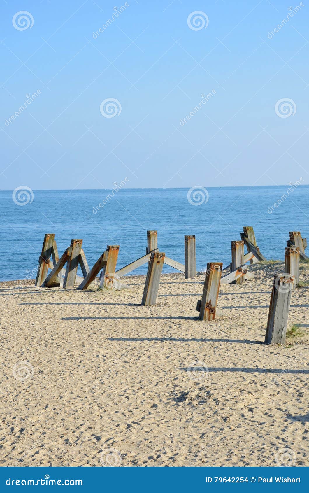 Weathered Wooden Posts in Ground by the Sea Stock Photo - Image of ...