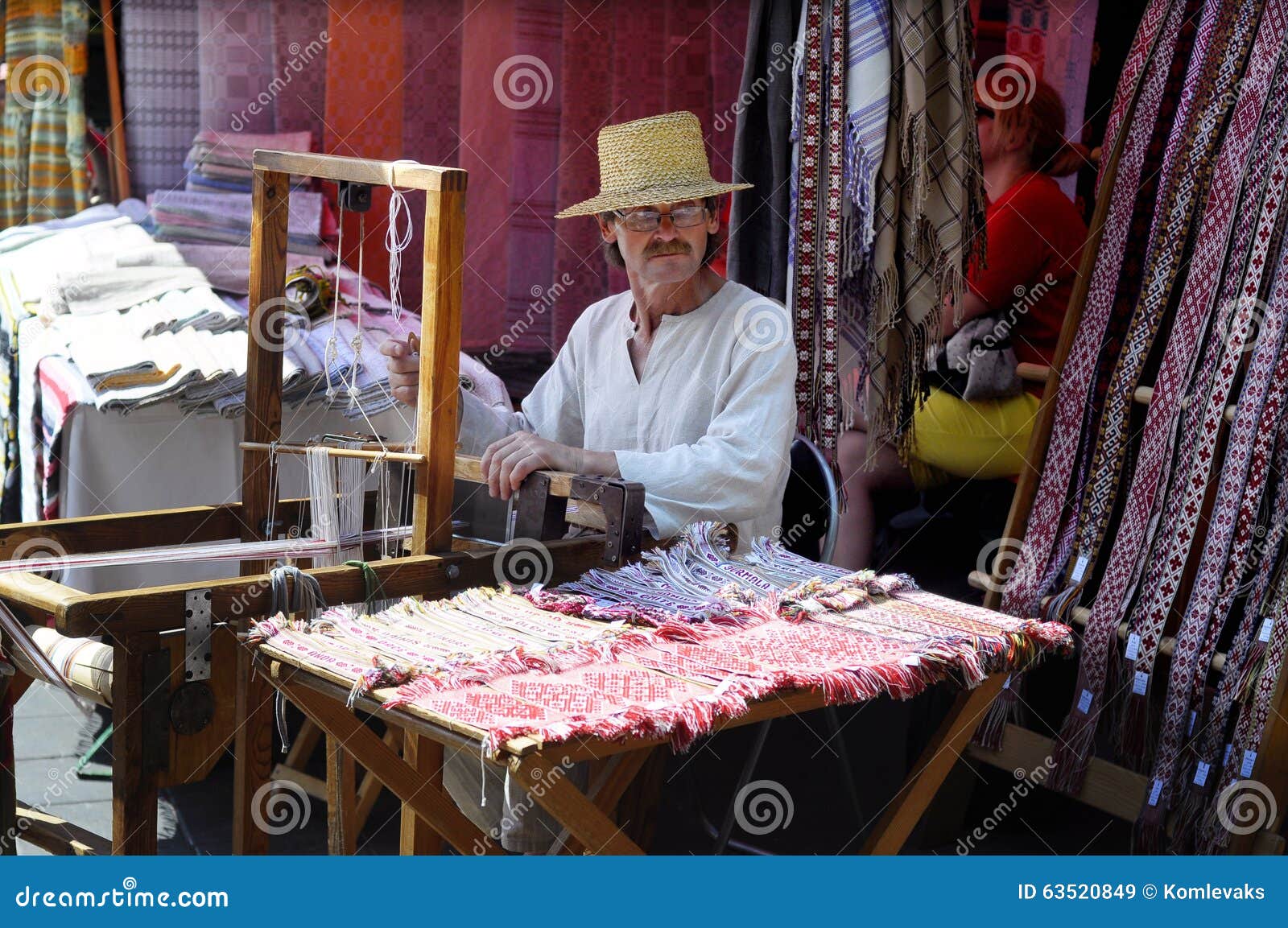 Weaver at street fair editorial stock image. Image of hobby - 63520849
