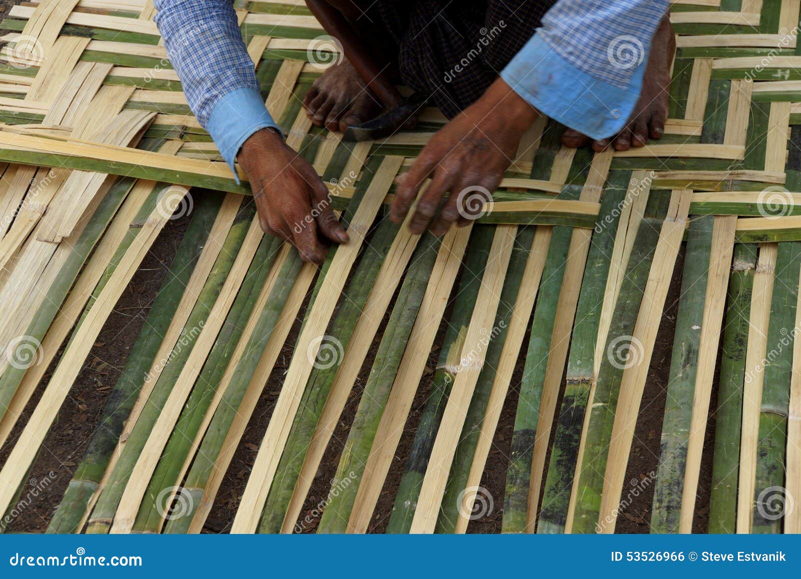 Weaving a bamboo mat stock photo. Image of craft, working - 53526966