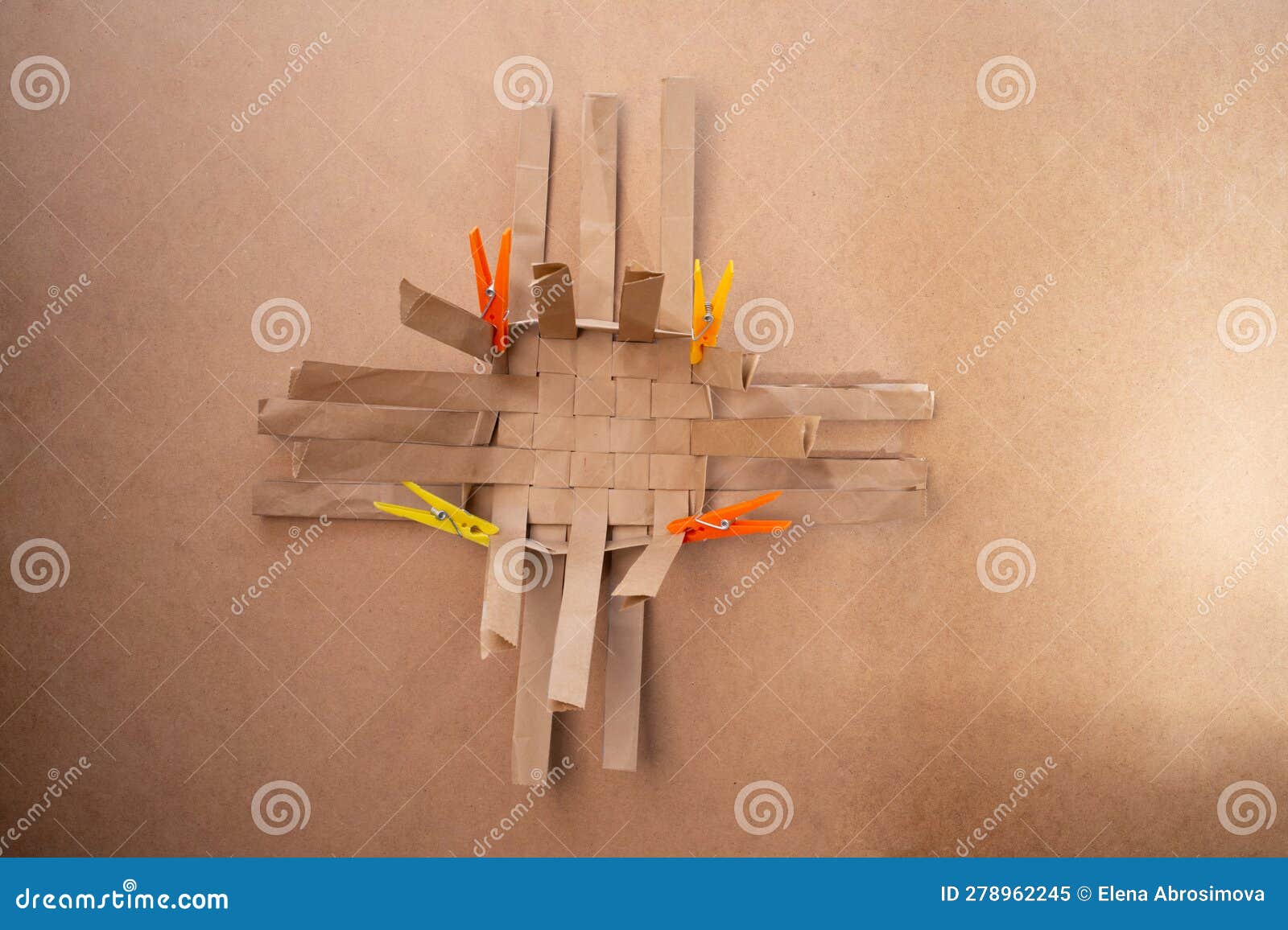 Weaving Paper Strips Fixed with Clothespins, Instructions for Making a ...