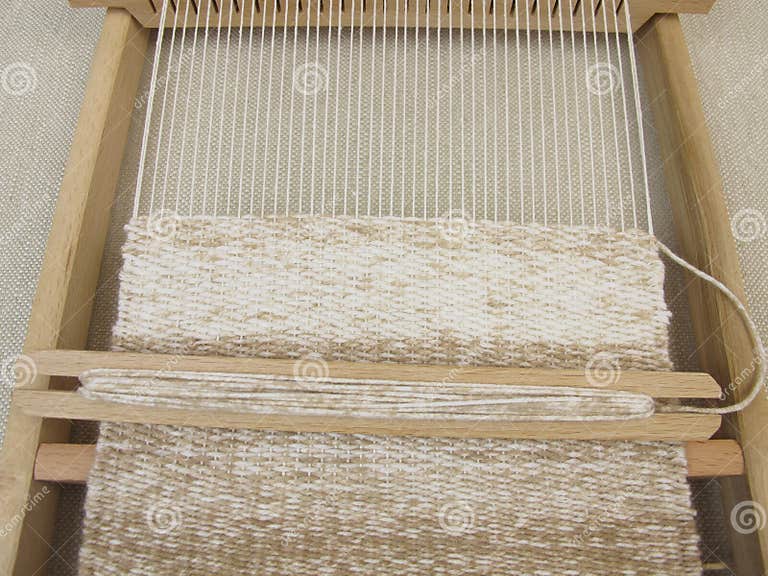 Weaving with weaving frame stock image. Image of loom - 63671109