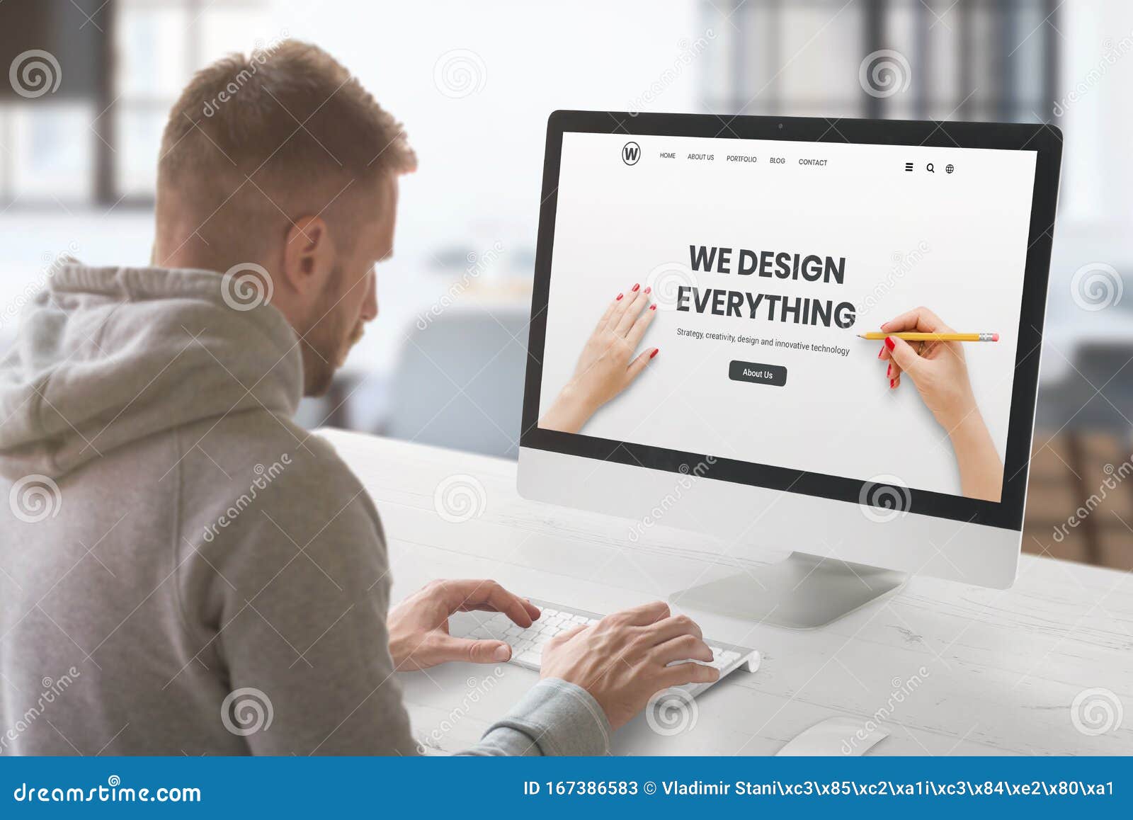 Web Design Studio with Concept Agency Web Page on Computer Display ...