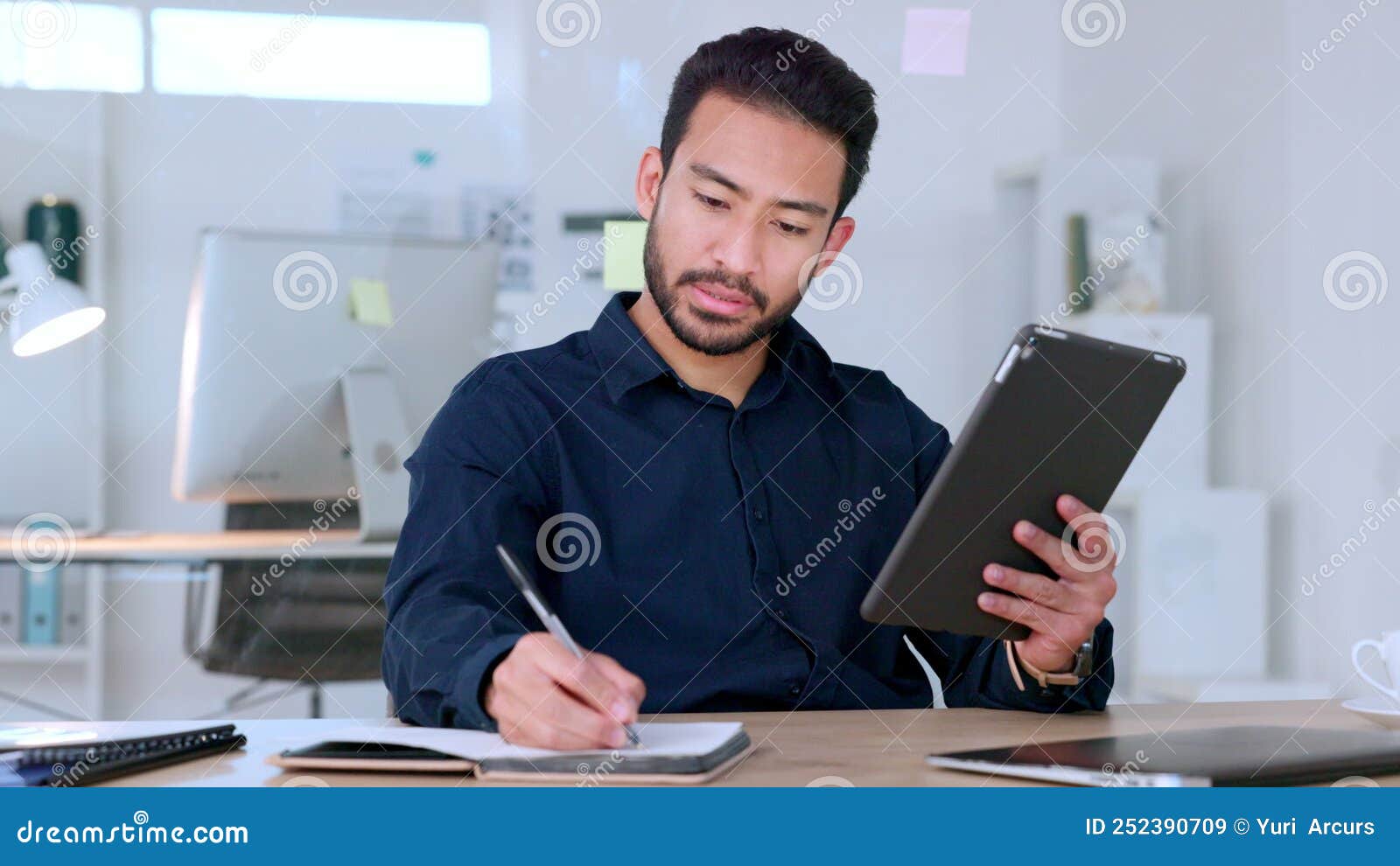 Web Developer Reading Digital Tablet, Writing Notes and Thinking of ...