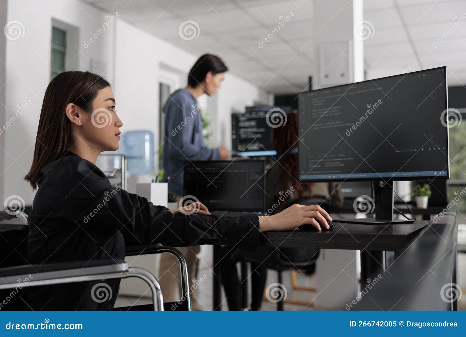 Web Developer in Wheelchair Working on Server Coding in Big Data Office ... Web Developer in Wheelchair Working on Server Coding in Big Data Office ...