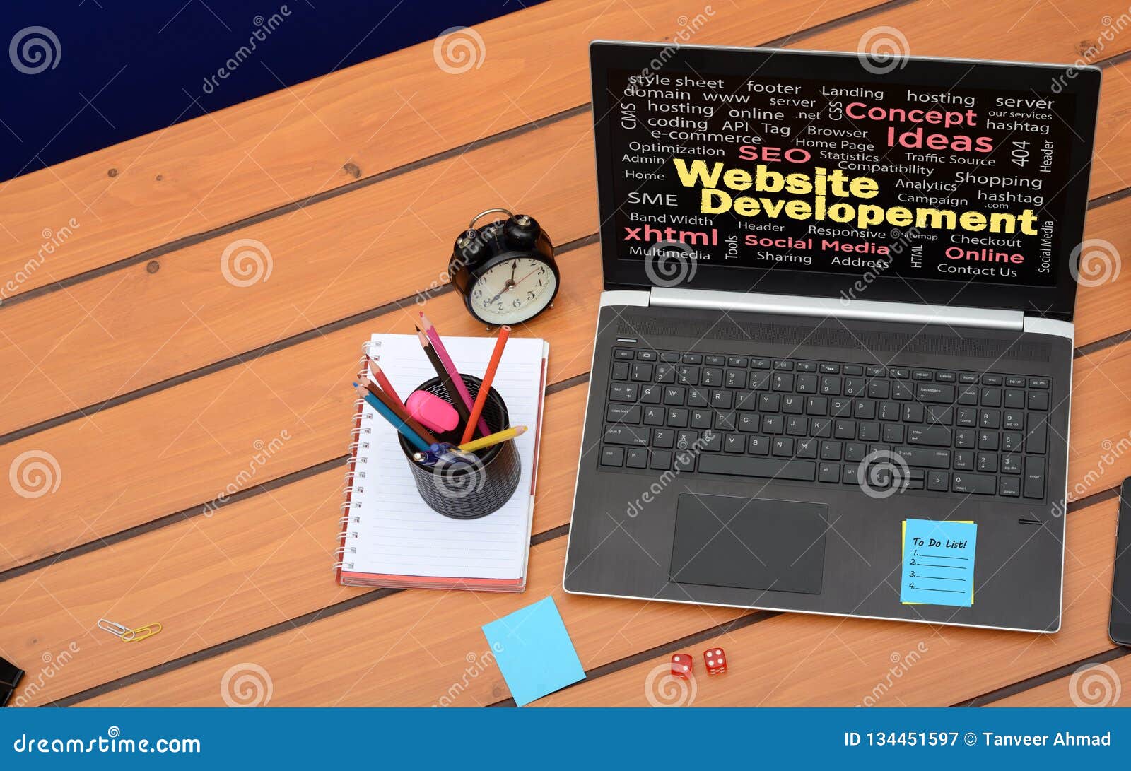 Web Development Theme with Laptop Screen on Wooden Background Stock ...