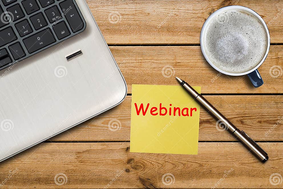 Webinar Concept. Webinar Written on Sticky Note, Laptop and Cup of ...