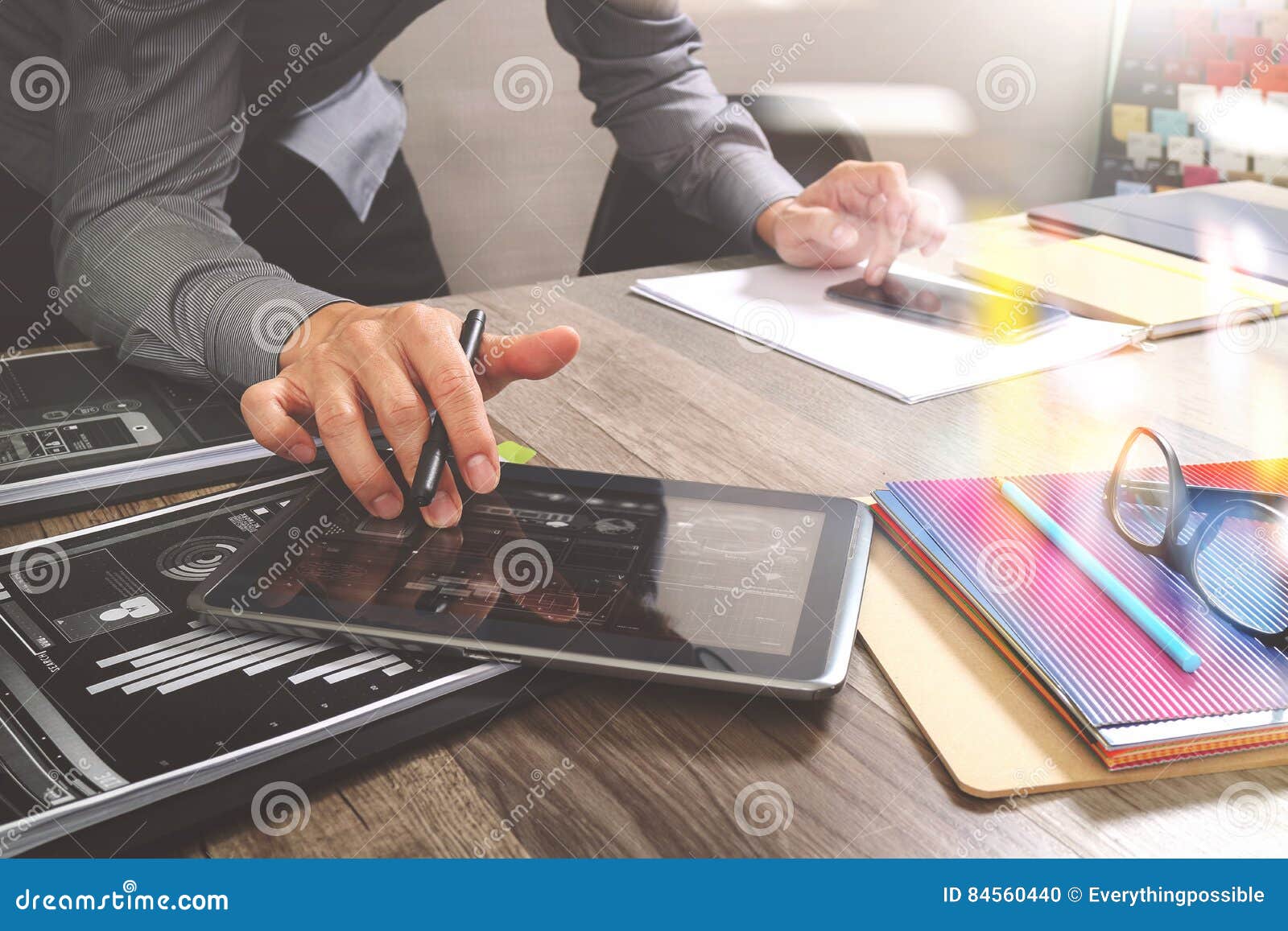 Website Designer Holding Smart Phone and Working Computer Digital ...