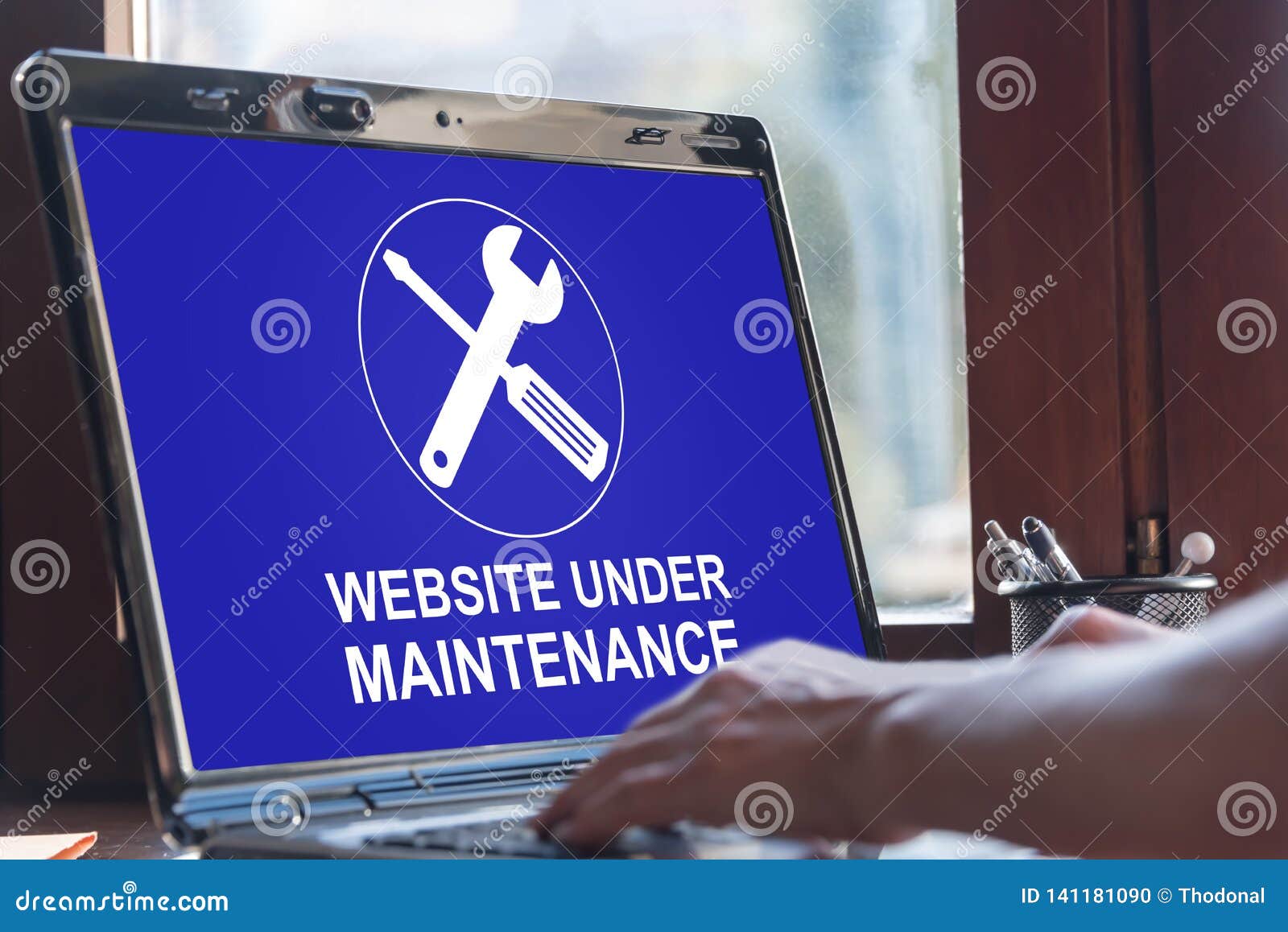 Website Maintenance Concept on a Laptop Screen Stock Photo - Image of ...