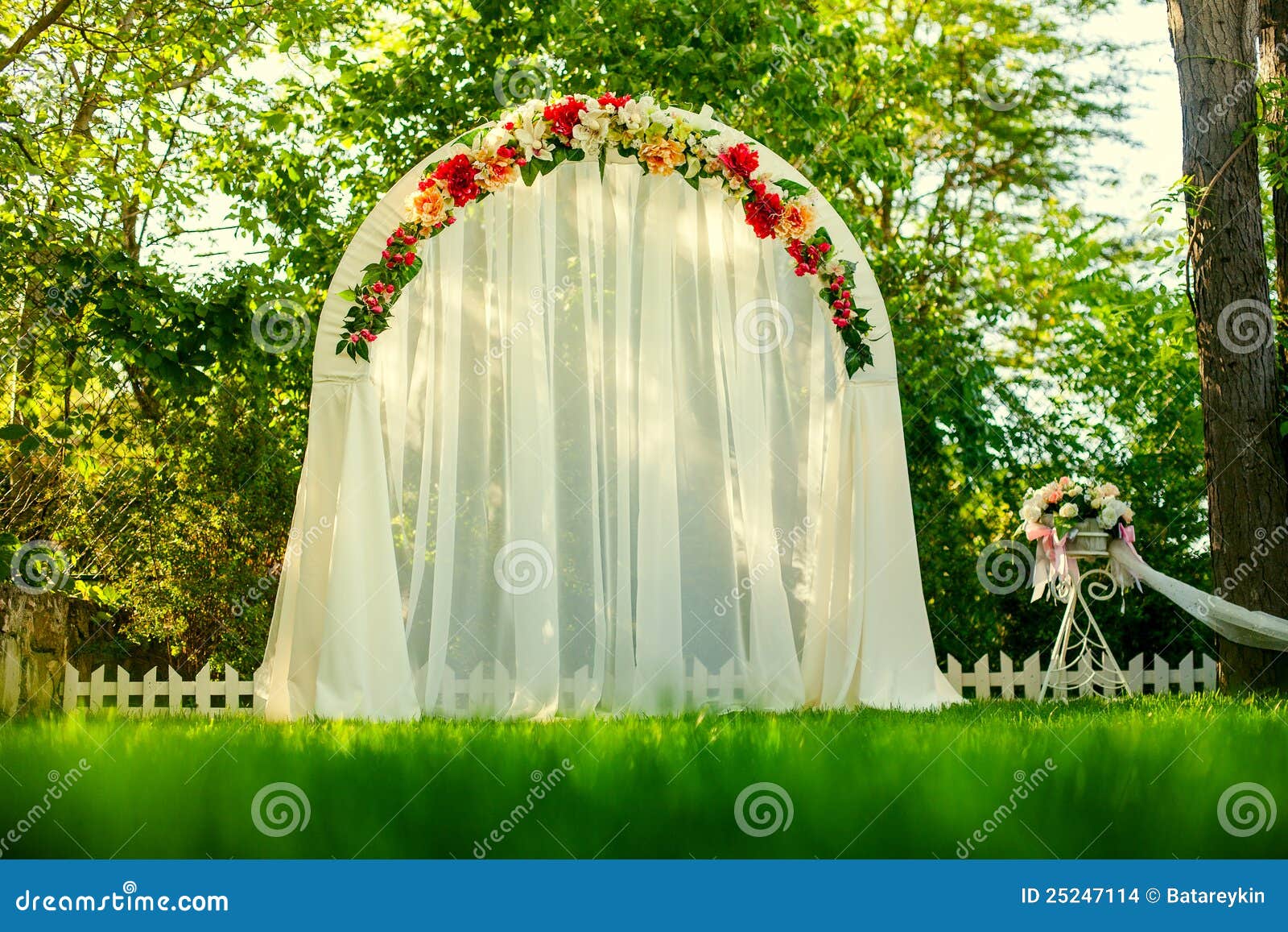 Wedding Arch on the grass stock photo. Image of bride - 25247114