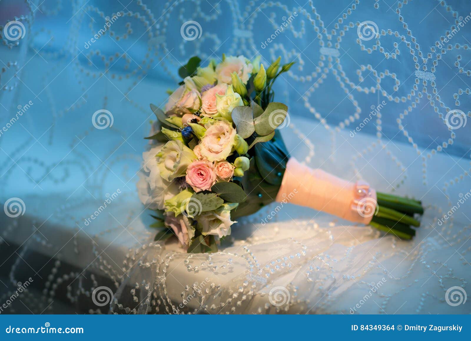 Wedding Bouquet of the Bride on a Blue Background Stock Photo - Image ...