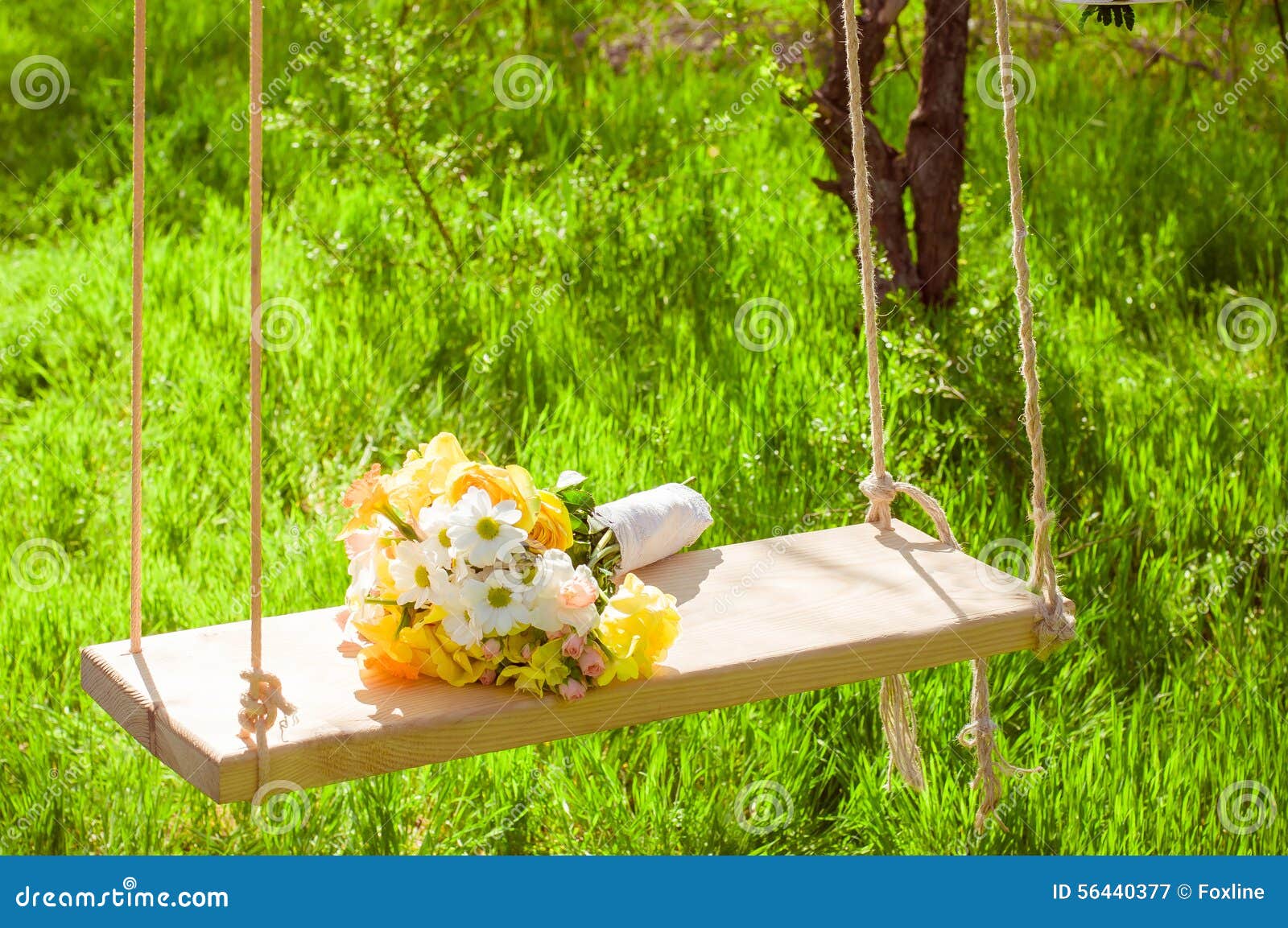 Wedding Bouquet of Flowers on a Swing Stock Image - Image of grass ...