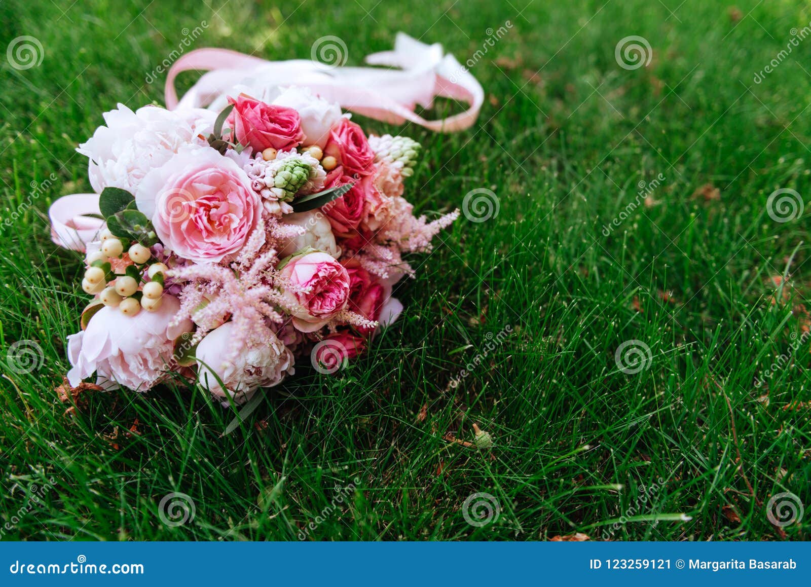 Wedding Bouquet of Roses on Green Grass Stock Image - Image of flower ...