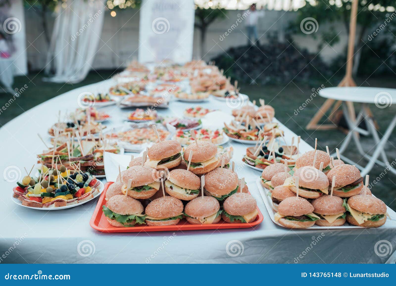 Wedding Buffet with Various Snacks and Burgers in Nature Stock Photo ...