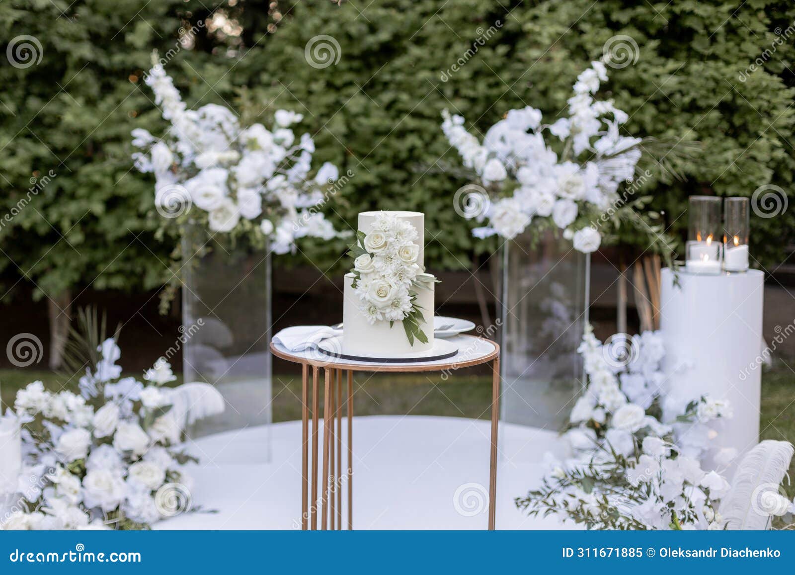 A Wedding Cake Near Arch for the Evening Ceremony Stock Image - Image ...