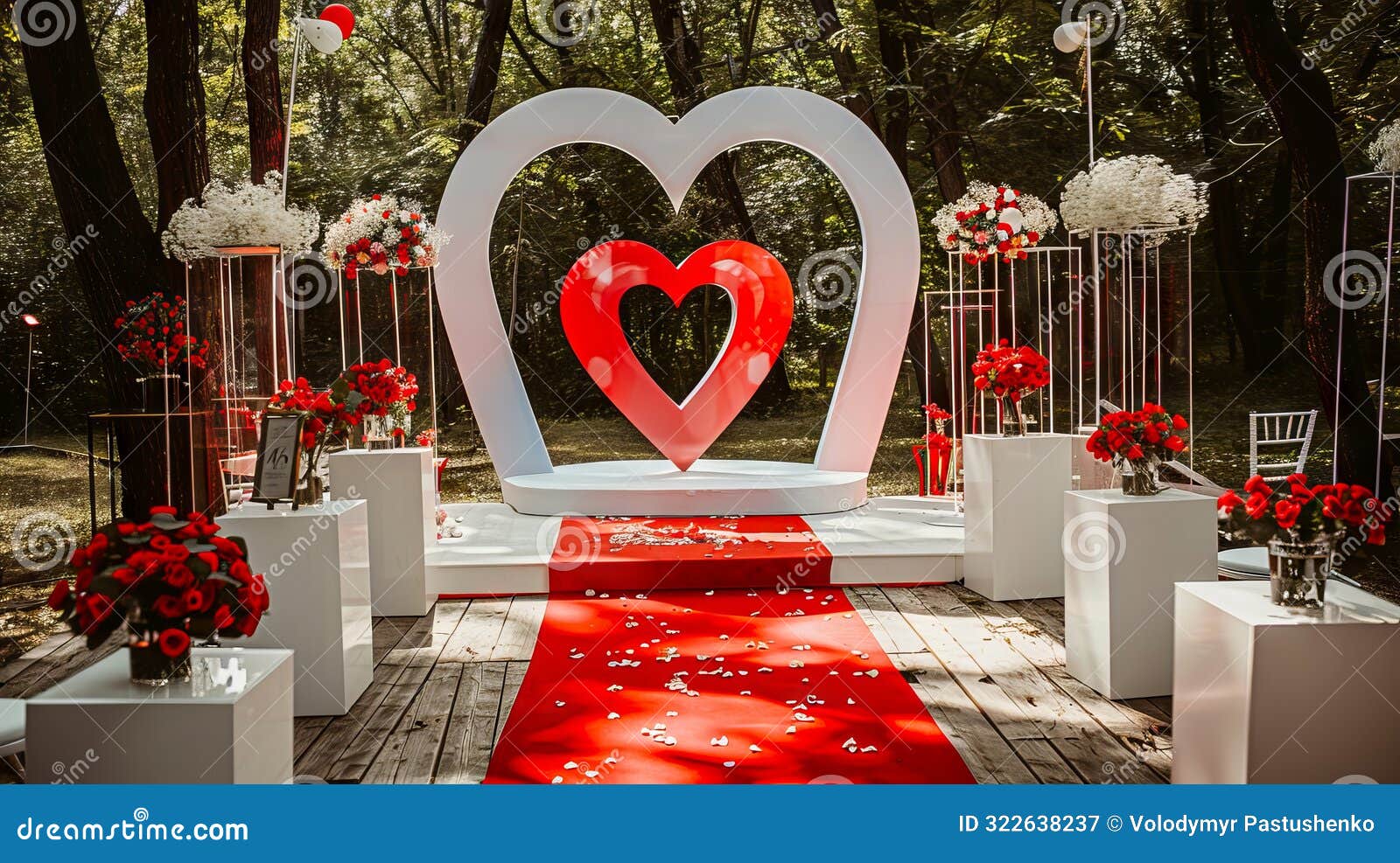 A Wedding Ceremony with Red Carpet and Heart Shaped Decorations Stock ...