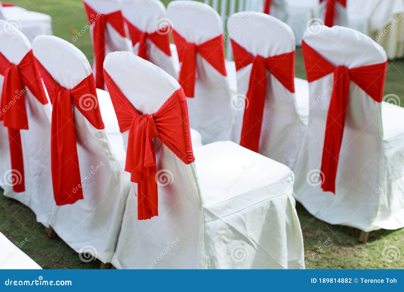 Wedding Chairs with Red Ribbon Stock Photo - Image of outdoor, wedding ...