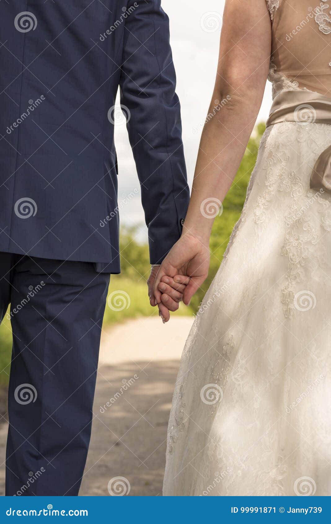 Wedding couple from behind stock image. Image of couple - 99991871