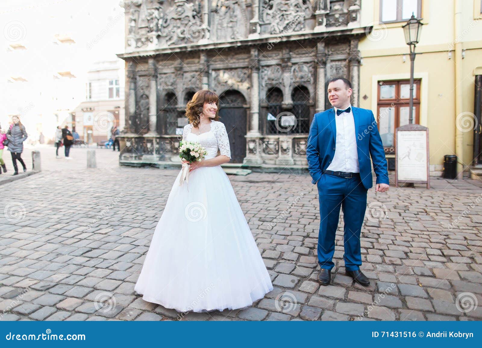 Wedding Couple of Bride and Groom Standing by Old Stone Chapel Stock ...