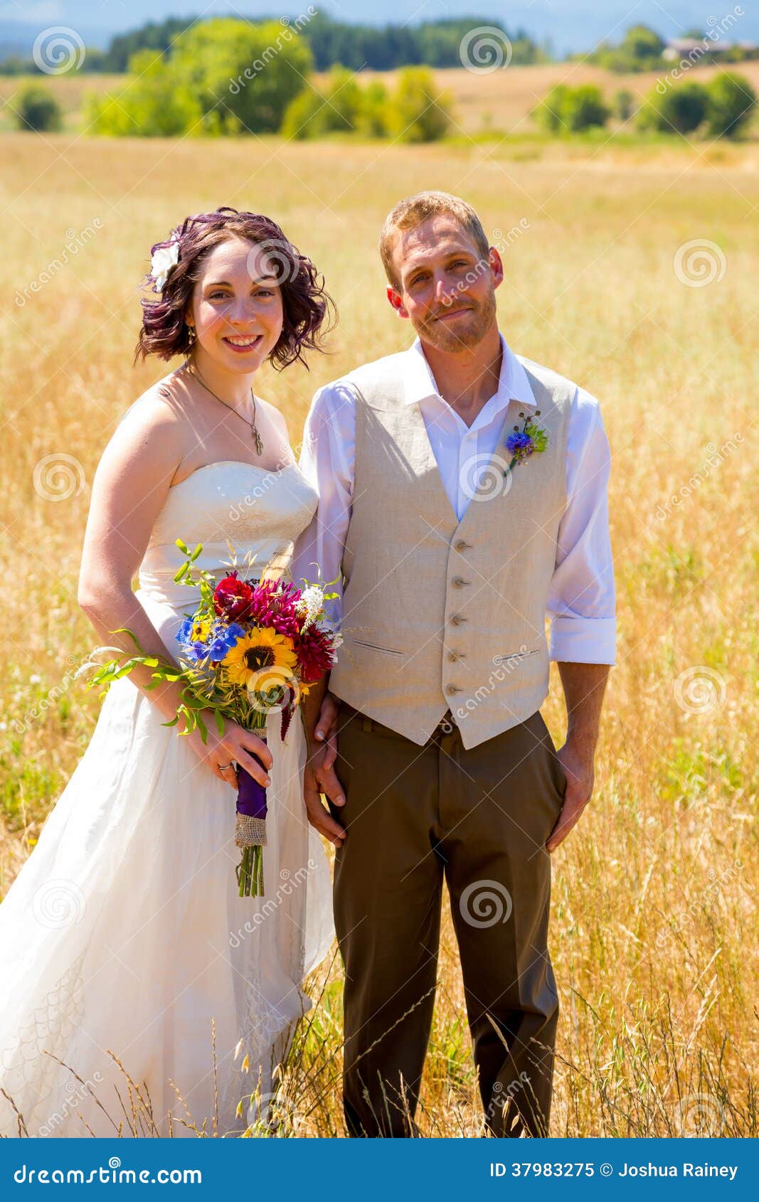 Wedding Couple in Field stock image. Image of commitment - 37983275