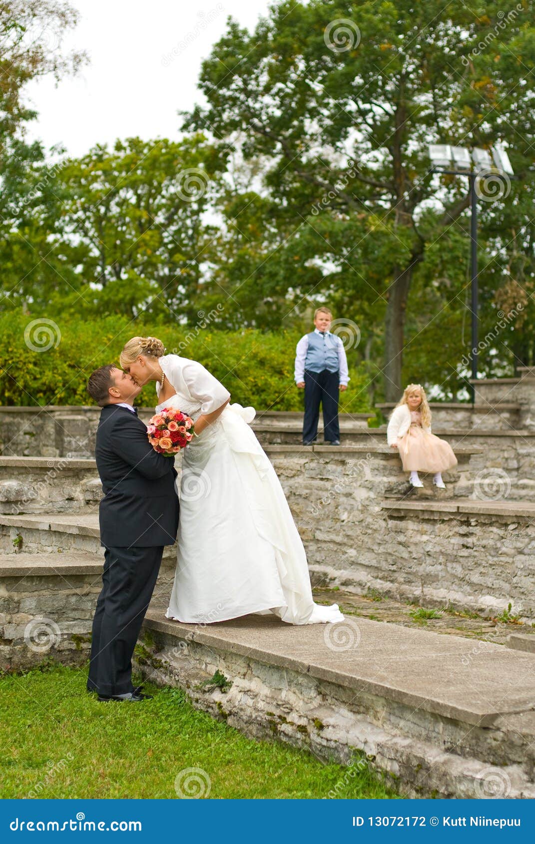 Wedding couple with kids stock photo. Image of agreement - 13072172