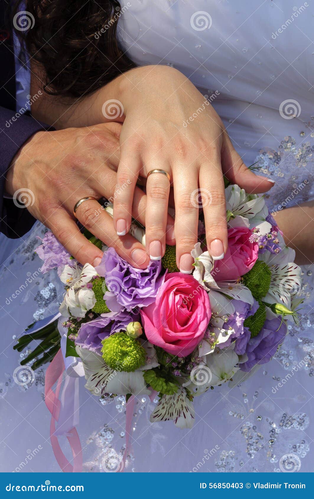 Wedding Couple Showing Rings Stock Image - Image of flowers, wife: 56850403