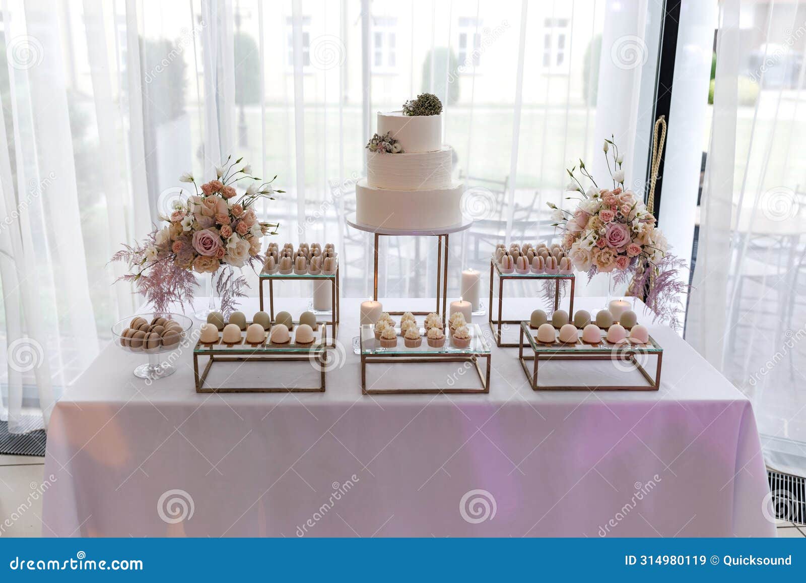 Cake table setup stock image. Image of assorted, table - 314980119